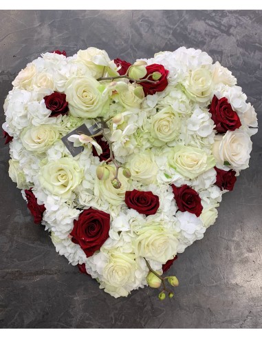 Red and white funeral heart
