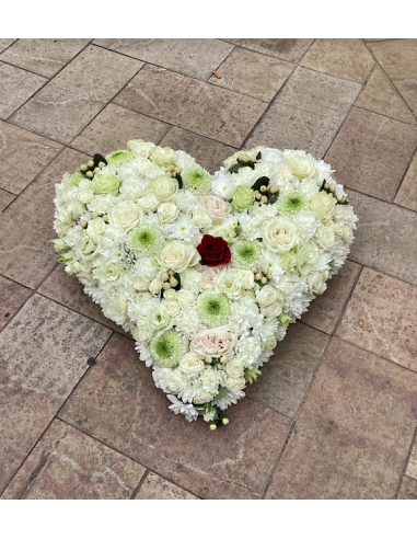 Red and white funeral heart